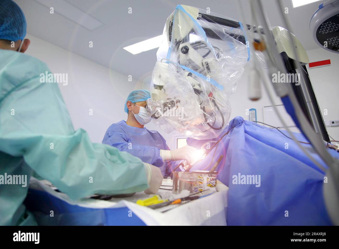 Treatment of a brain aneurysm. Surgical operation on the brain. A team ...