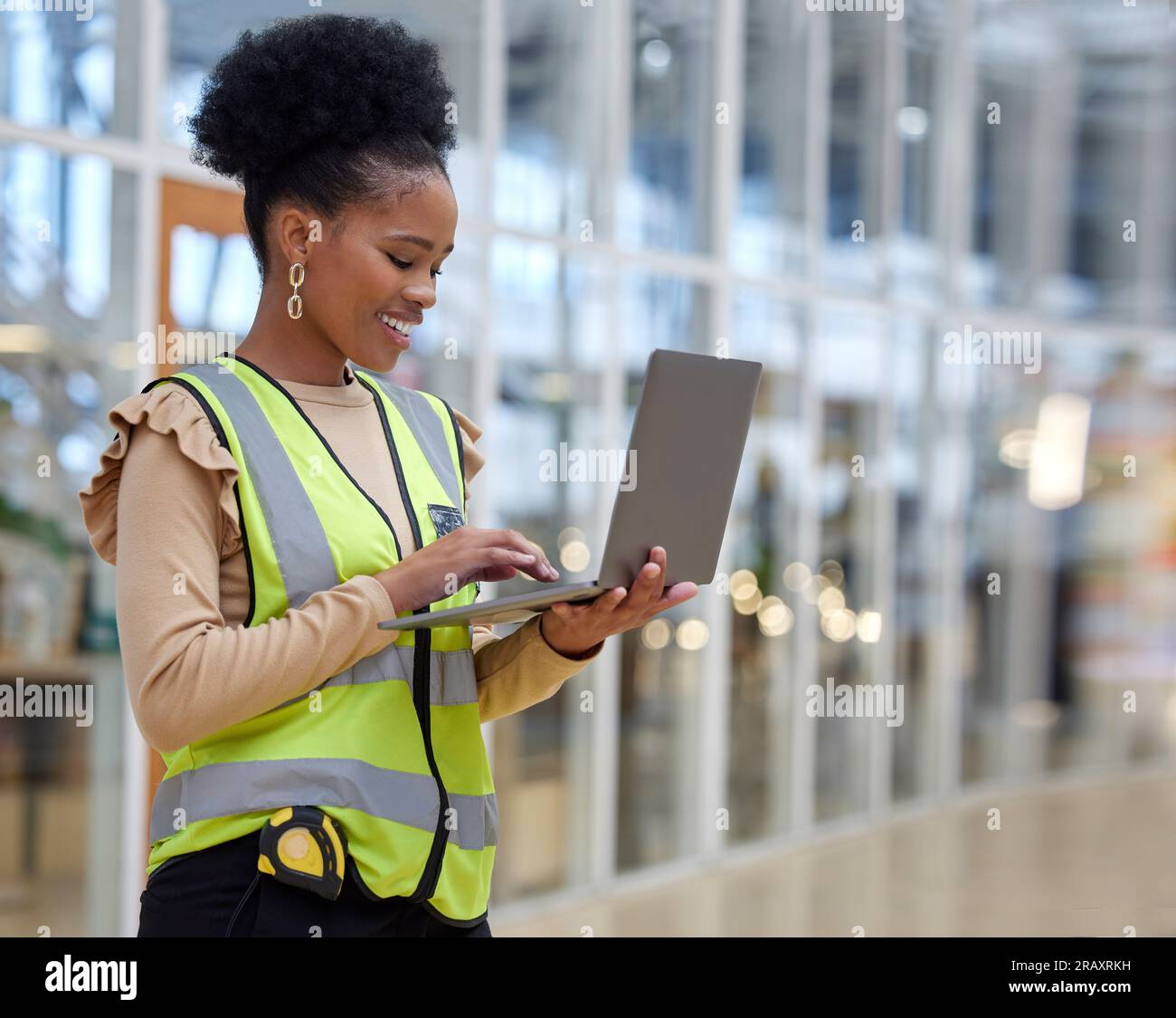 Project, woman and contractor with laptop at constriction site with ...