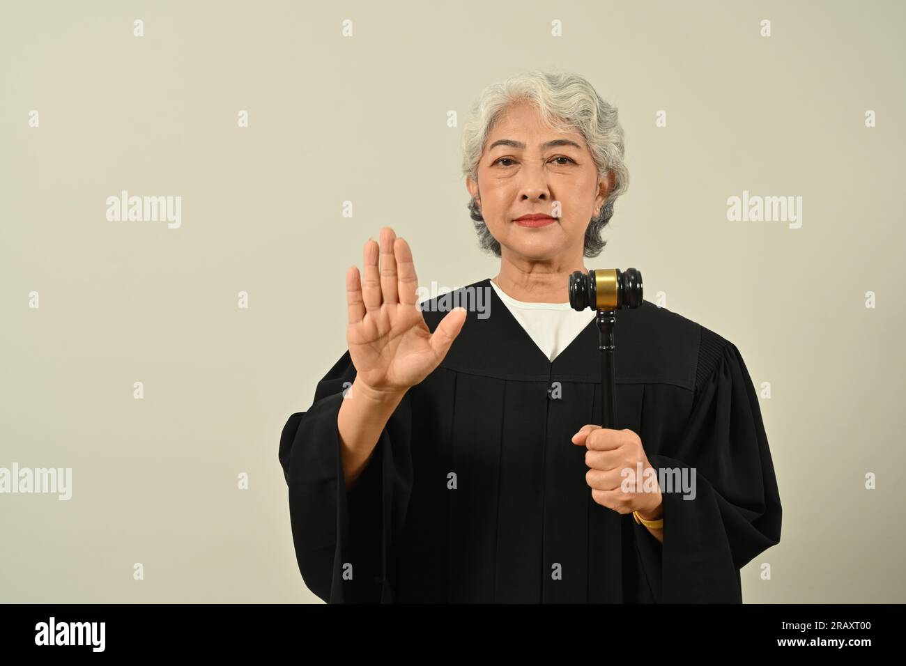 Judge gavel gown hand hi-res stock photography and images - Alamy