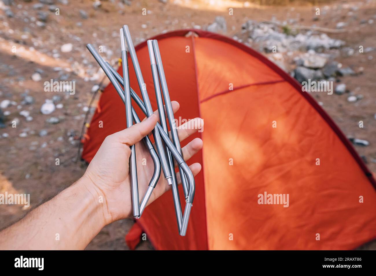 Aluminum frame arcs for the installation of a hiking tent in the hand ...