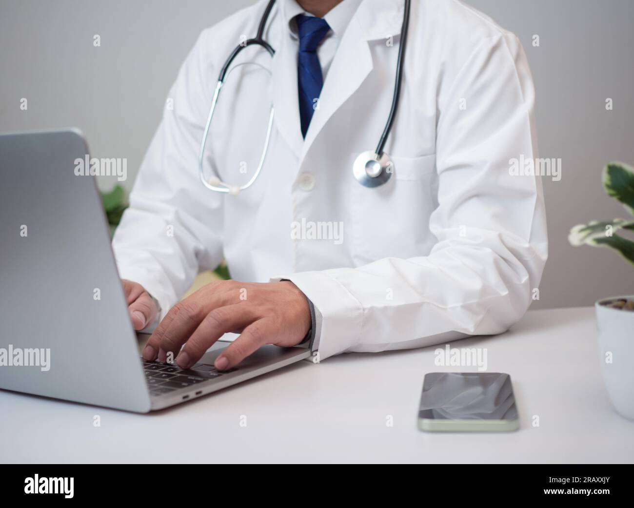 Doctors use smartphones and computers to research medical information ...