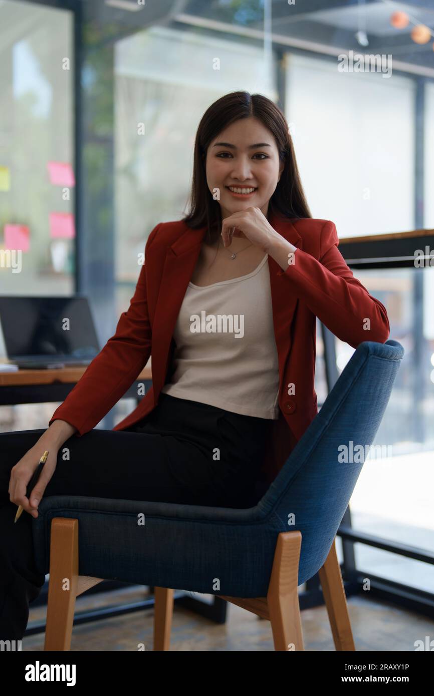 Portrait of a woman business owner showing a happy smiling face as he ...