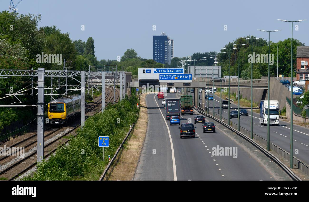 CLass 323 in Northern trains livery travelling on track running ...