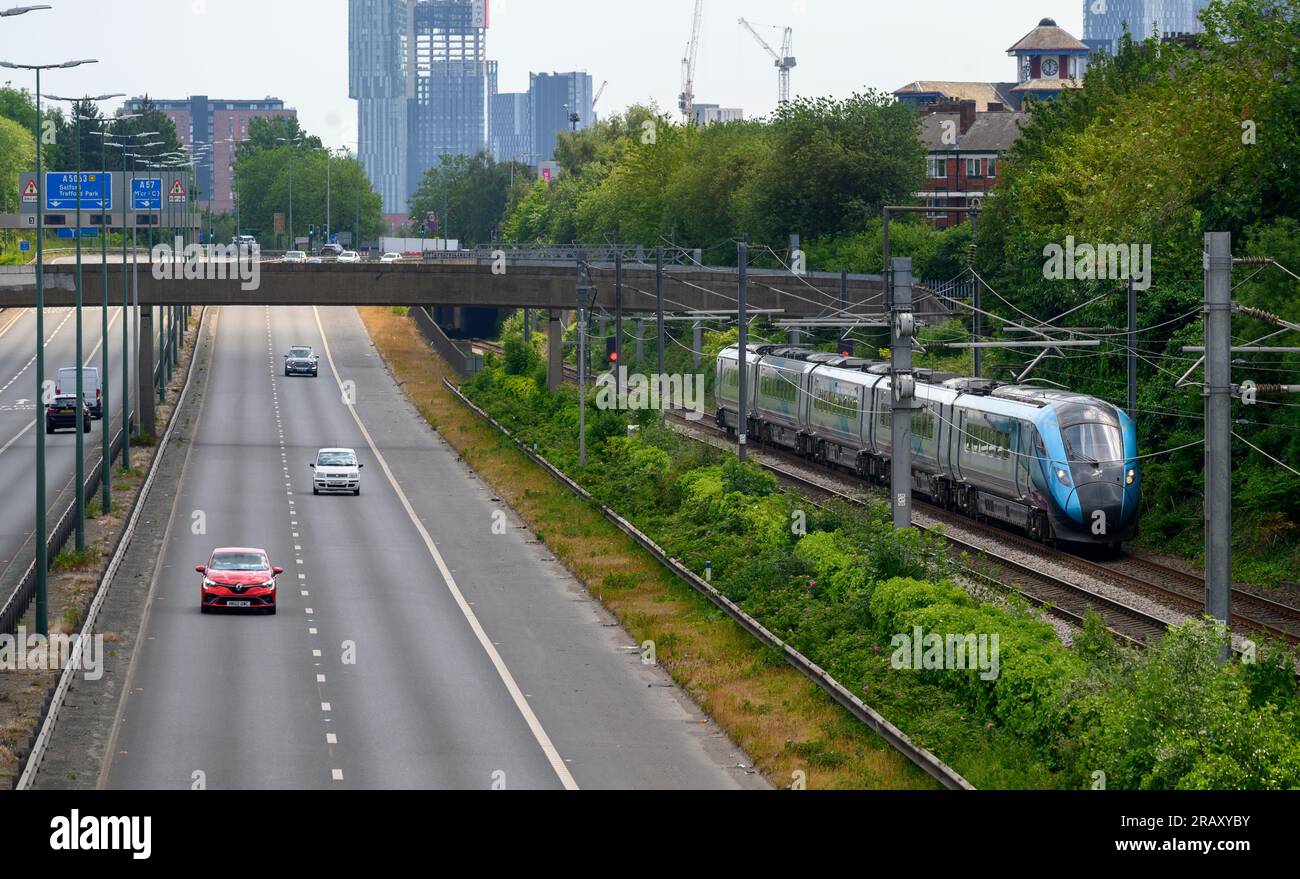 Rail road alongside highway vehicles hi-res stock photography and ...