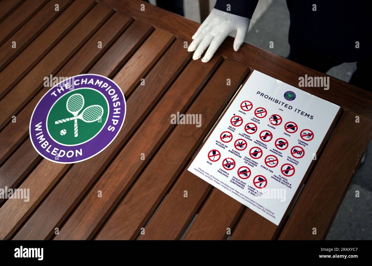 A list of prohibited items on a search table on day four of the 2023 ...