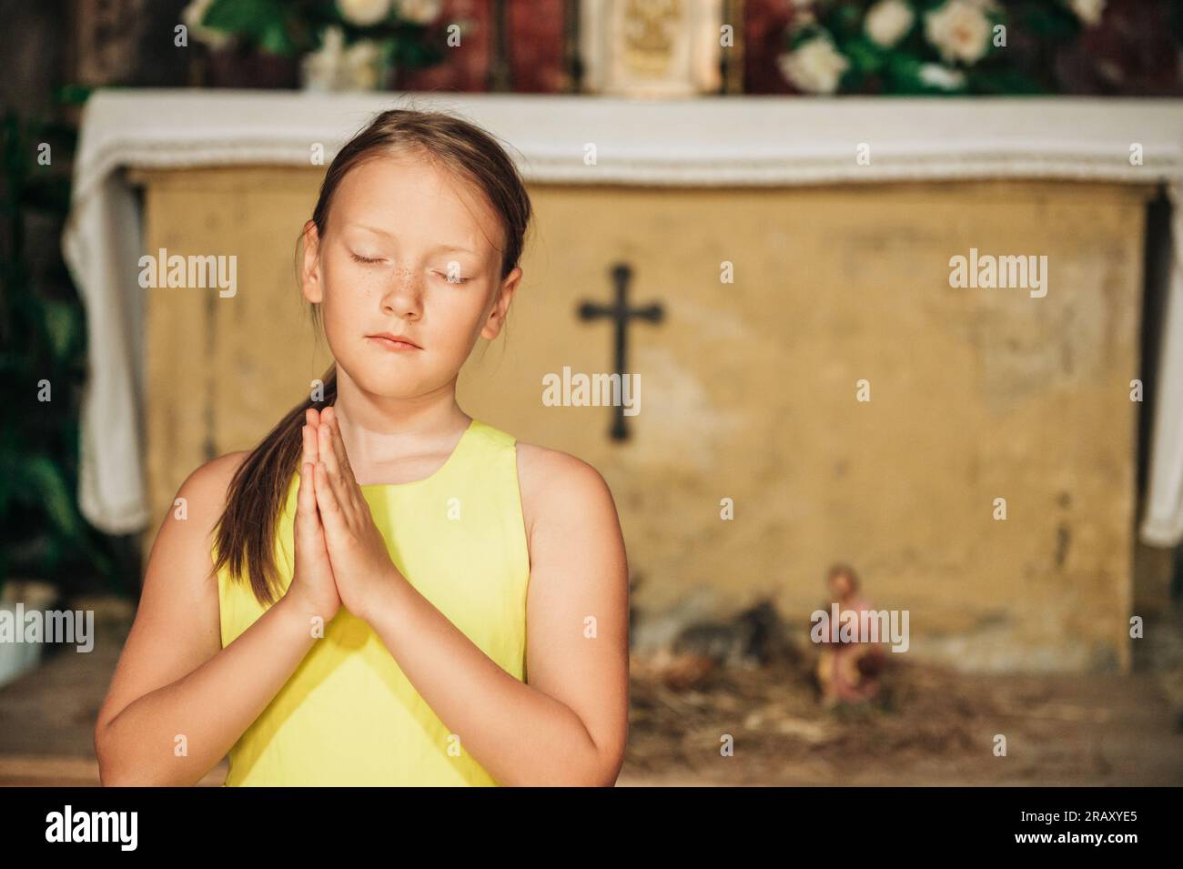 Little Girl Praying In Church