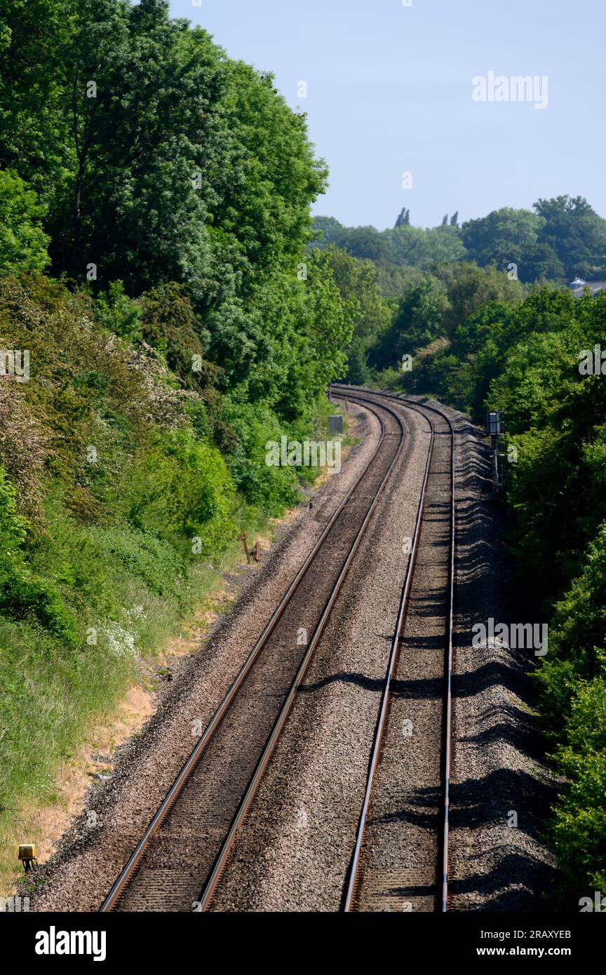 Empty railway track stretching into the distance, England Stock Photo ...