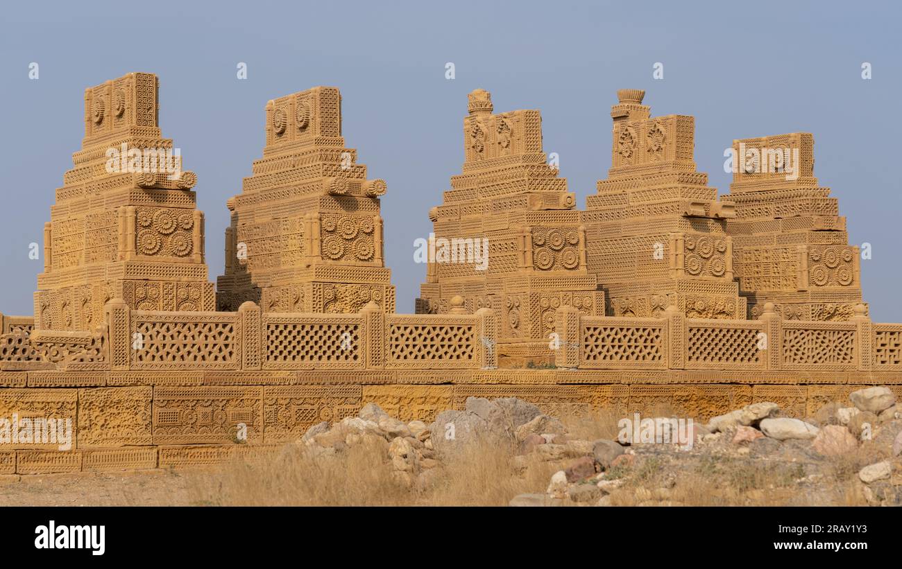 Group of ancient islamic carved sandstone cenotaphs or tombs on a ...