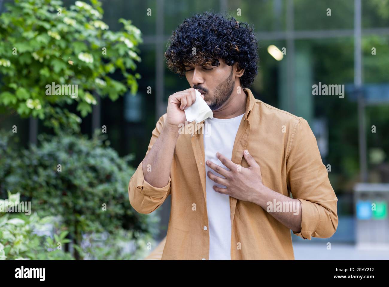 Young man student coughing street hi-res stock photography and images ...