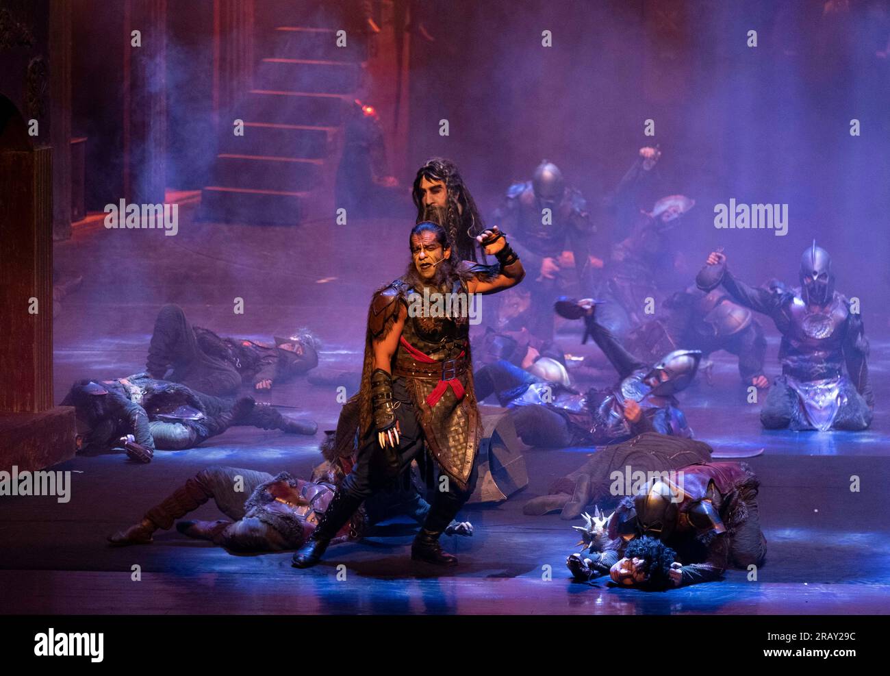 Iranian actor, Banipal Shomon (C) performs with other actors in the ...