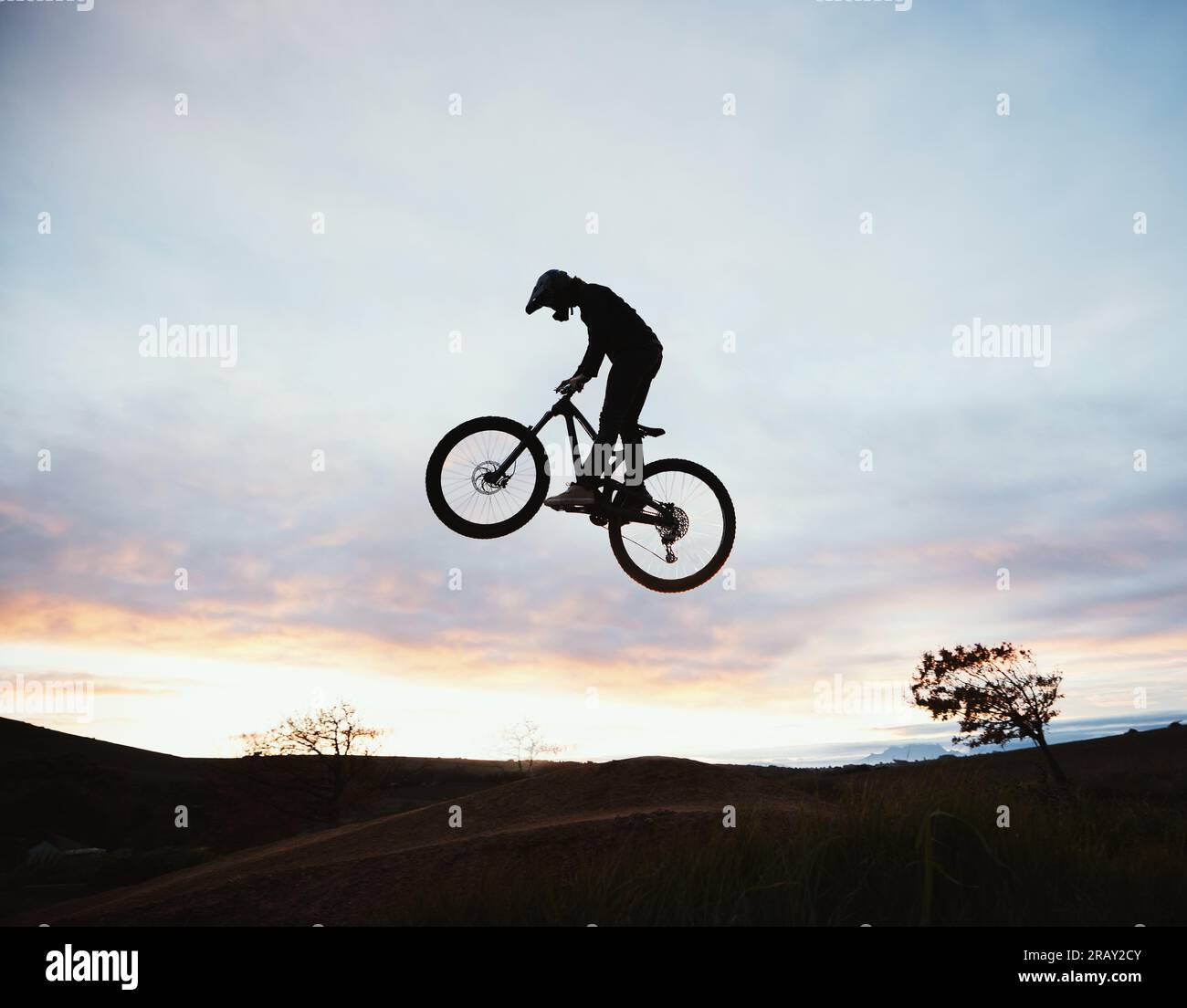 Jump, motorcycle and sunset with sport or sky and adventure in nature ...