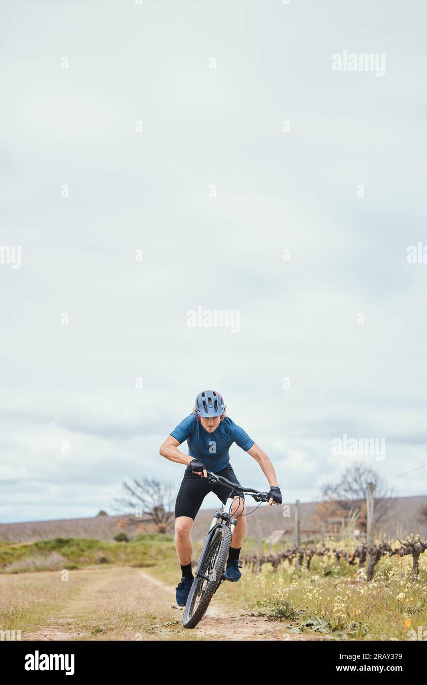 Exercise, man and cycling for fitness, bike and training with wellness ...