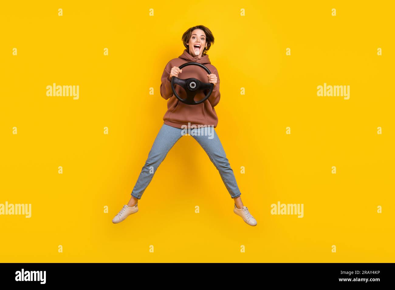 Full body size photo of jump crazy girl wear hoodie drive crazy ...