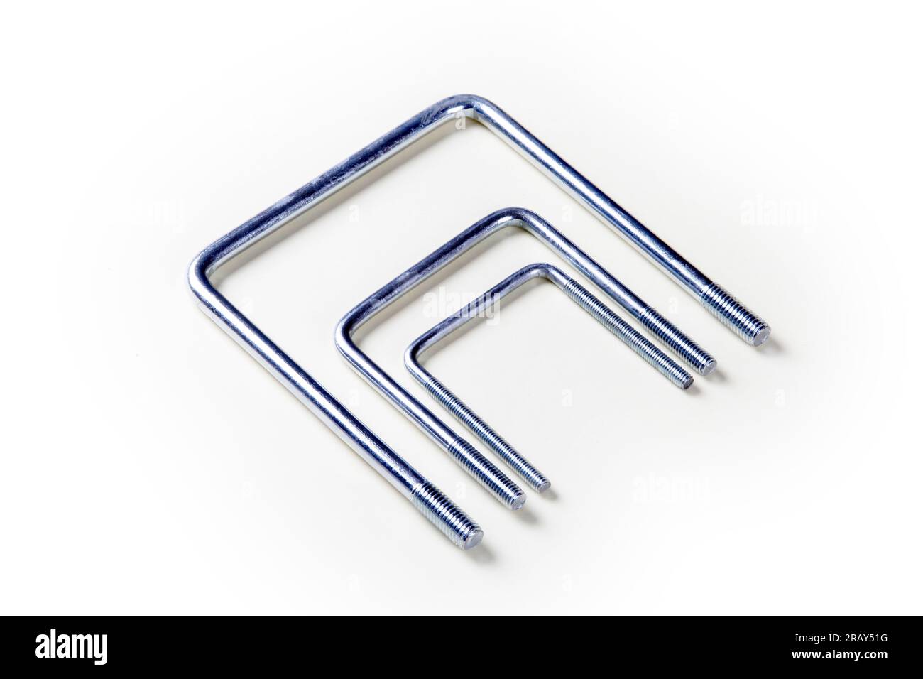 steel screws on a white background Stock Photo - Alamy