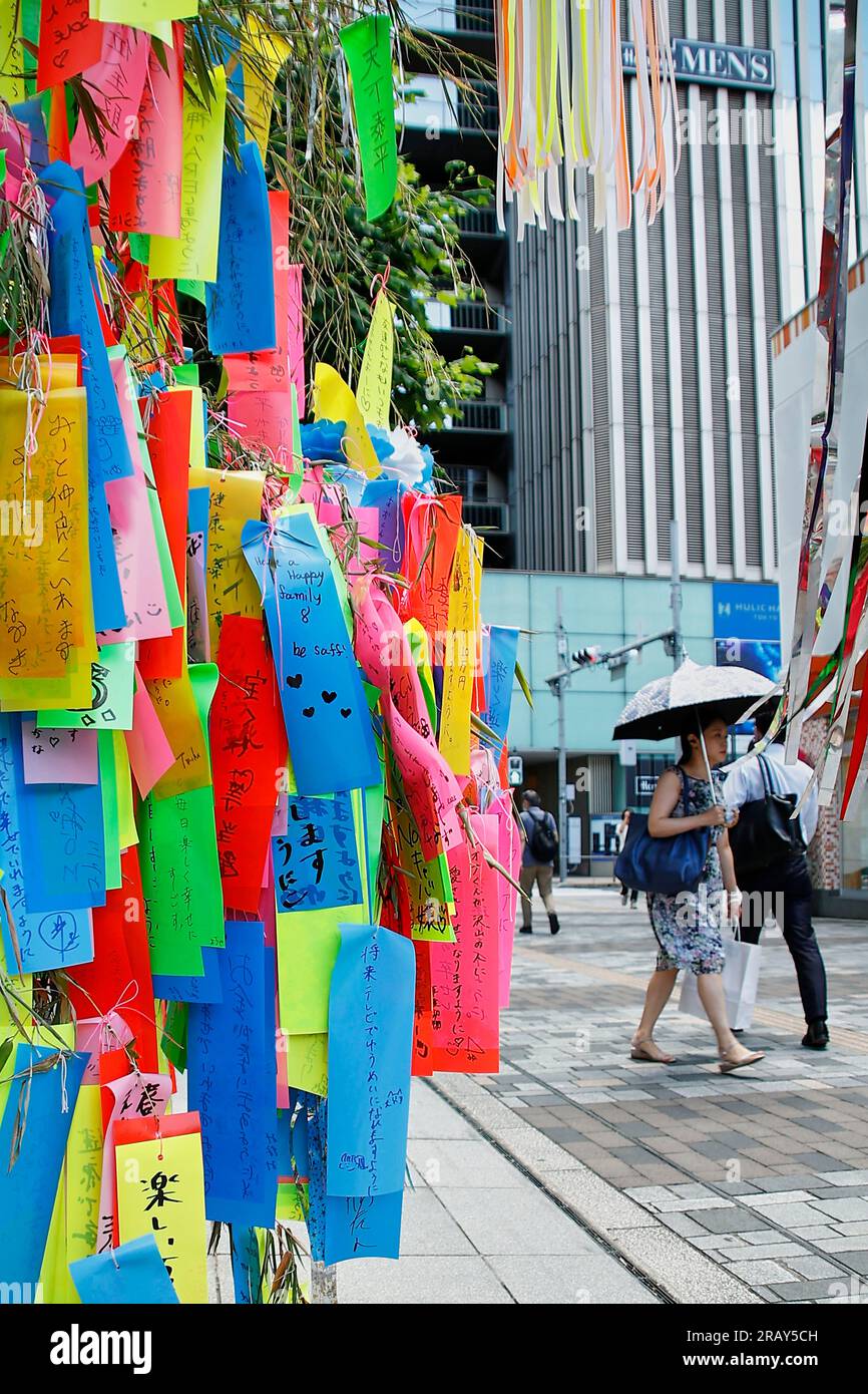 Colorful papers (Tanzaku) with the wishes of people to celebrate the ...