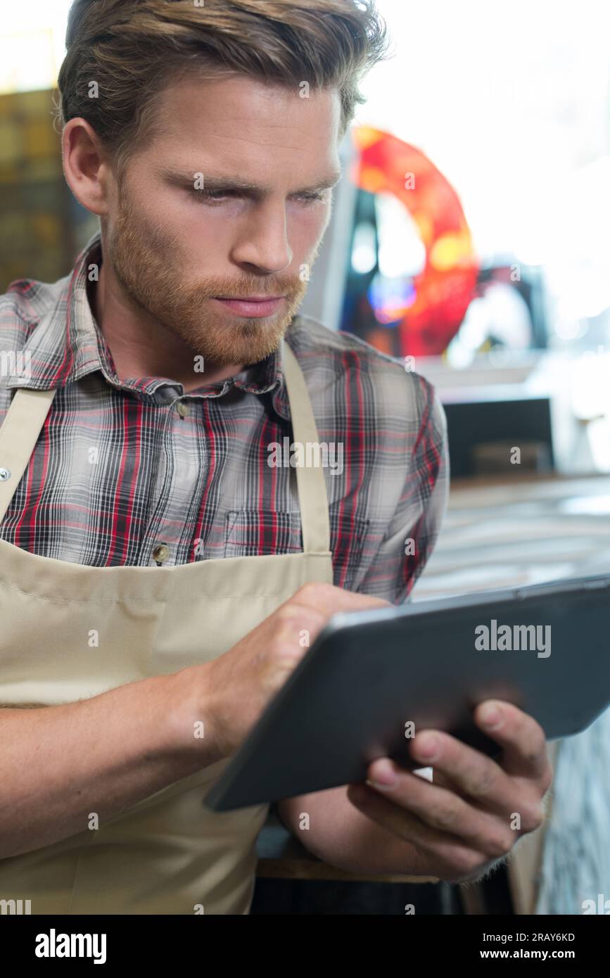 Tattoo studio worker hi-res stock photography and images - Alamy