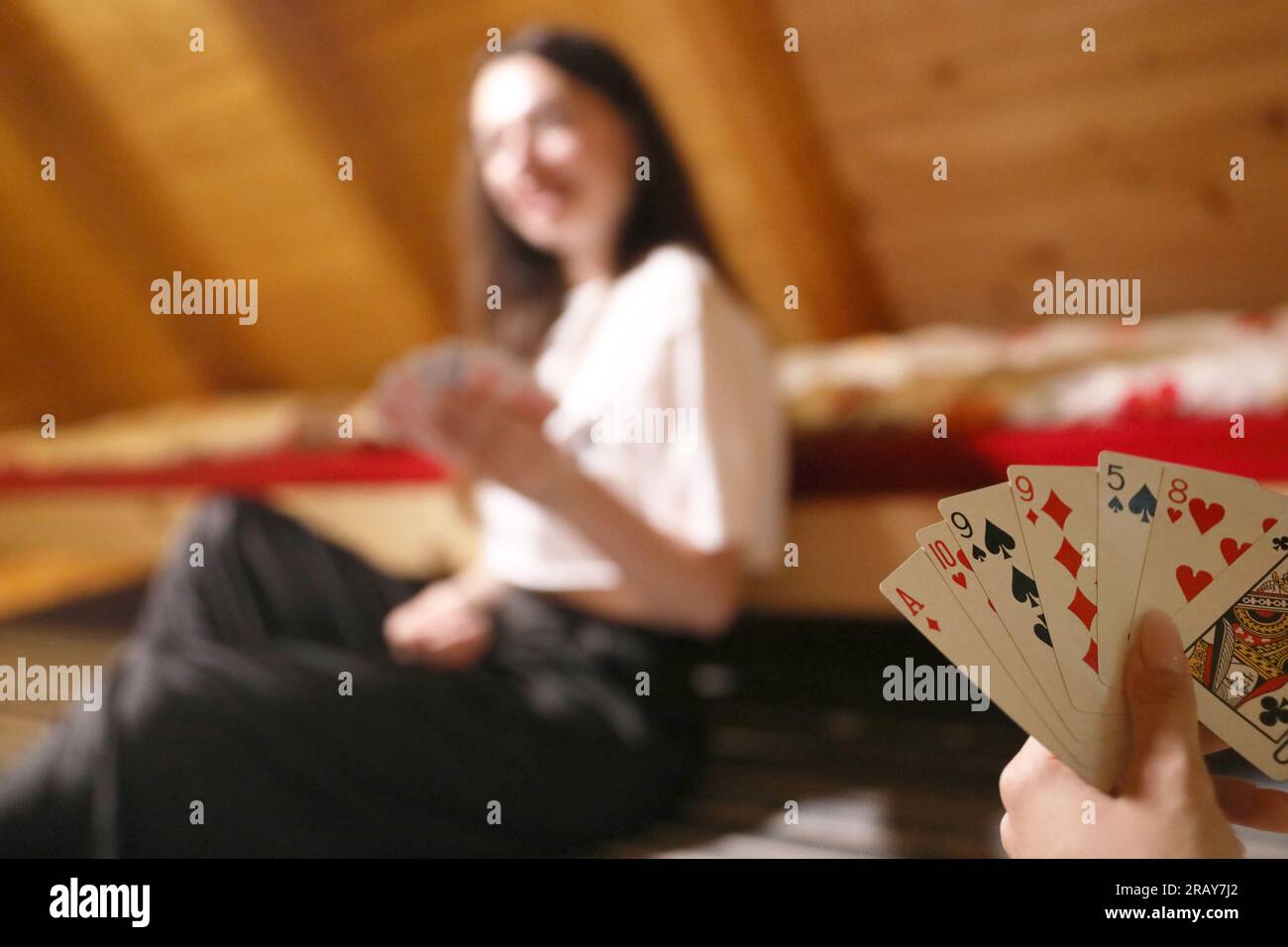 Experience the excitement of a card game through this captivating image ...