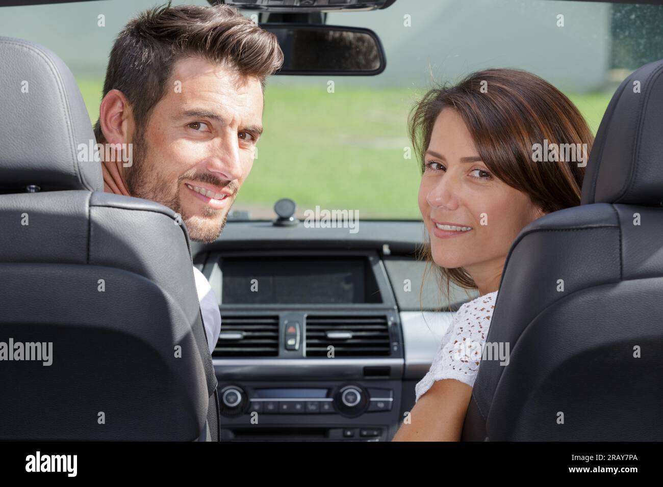 couple in their new car Stock Photo - Alamy