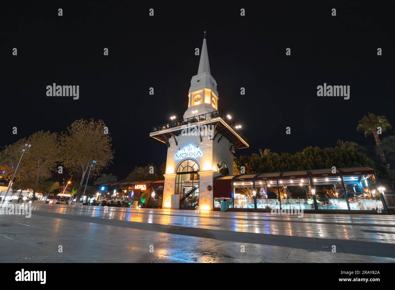11 October 2022, Kemer, Turkey: Clock tower with Mokka cafe on a ...