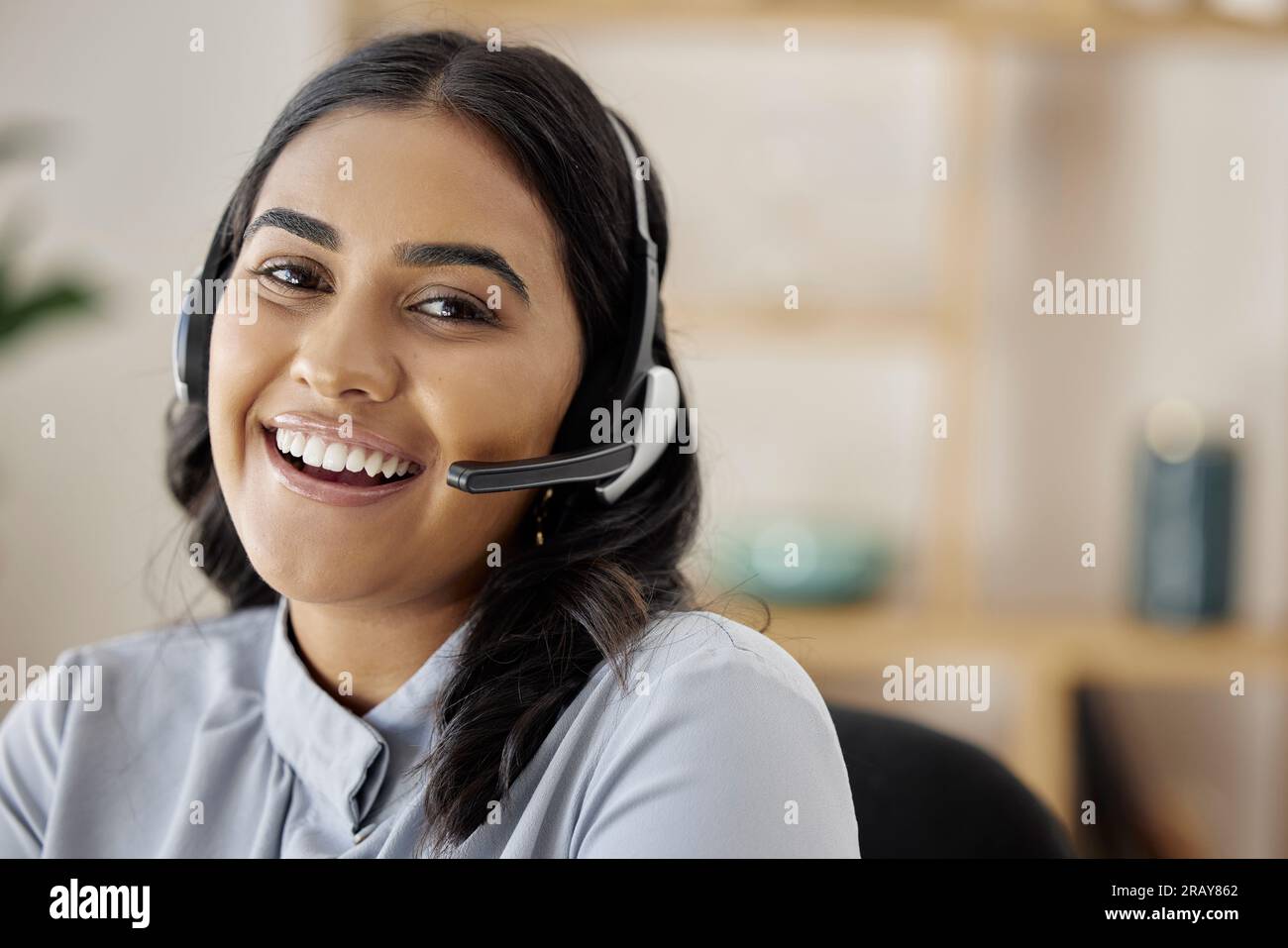 Portrait, customer support or happy woman in call center with mic on ...