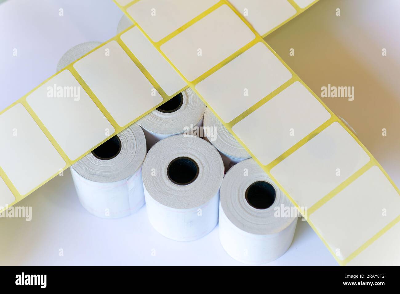 Rolls of white labels isolated. Labels for direct thermal or thermal ...