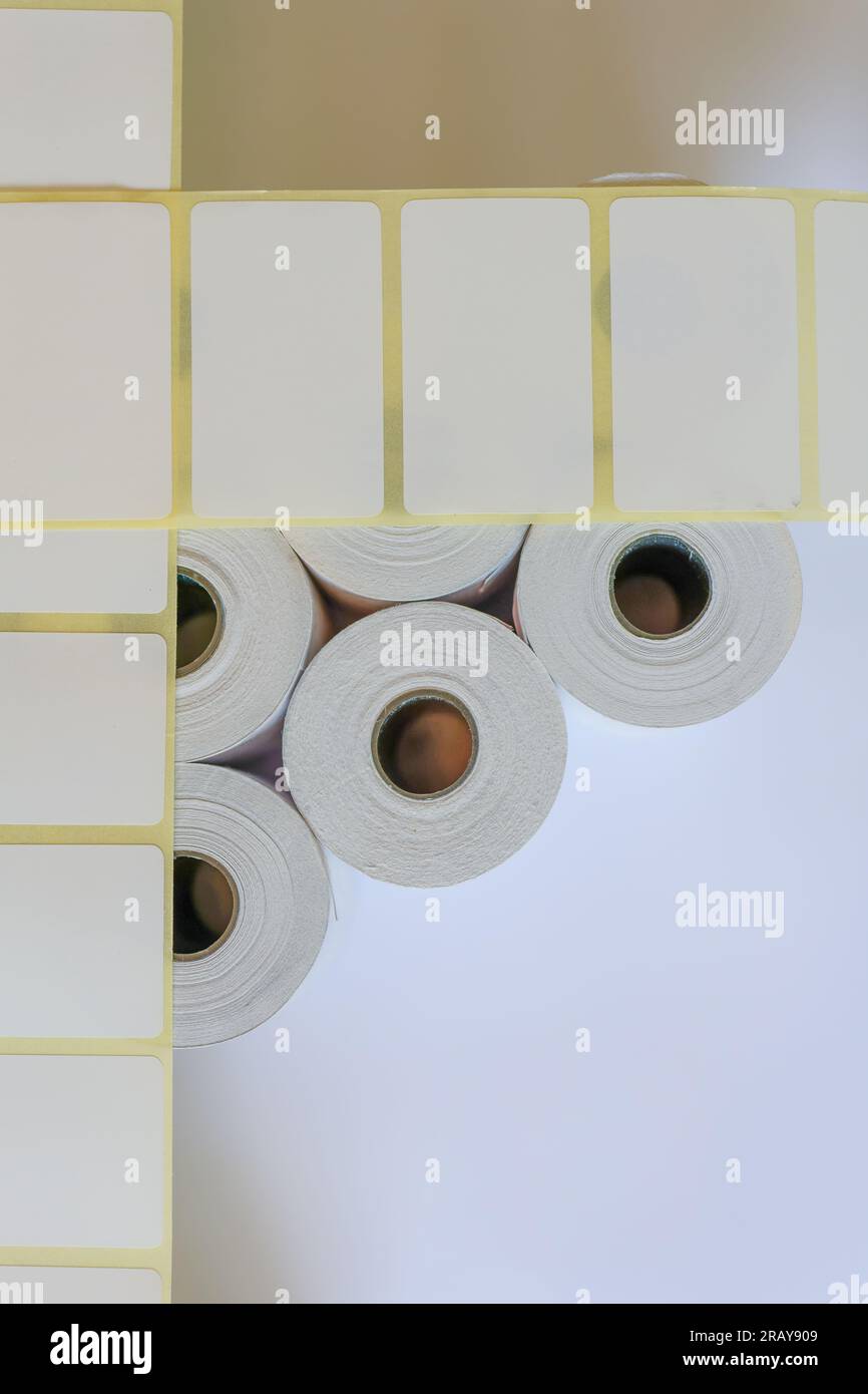 Rolls of white labels isolated. Labels for direct thermal or thermal ...