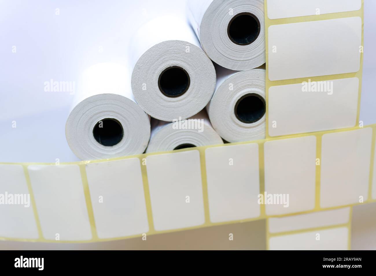 Rolls of white labels isolated. Labels for direct thermal or thermal ...