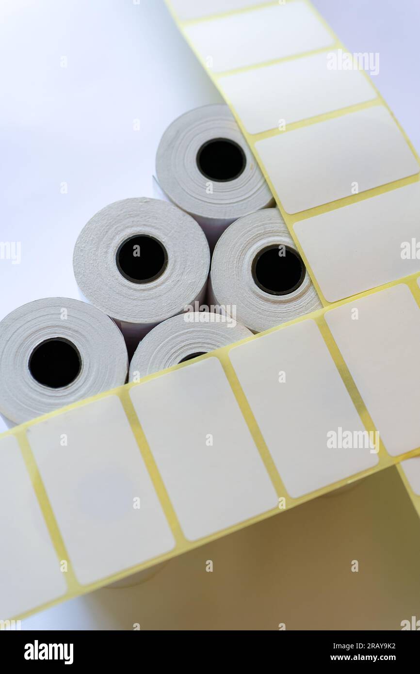 Rolls of white labels isolated. Labels for direct thermal or thermal ...