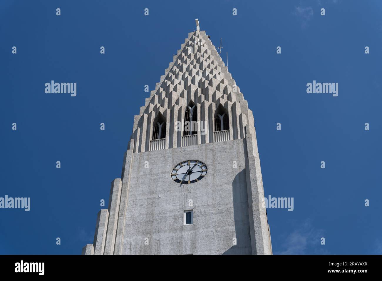 Clock tower of Hallgrimskirkja Church in Reykjavik, Iceland Stock Photo ...