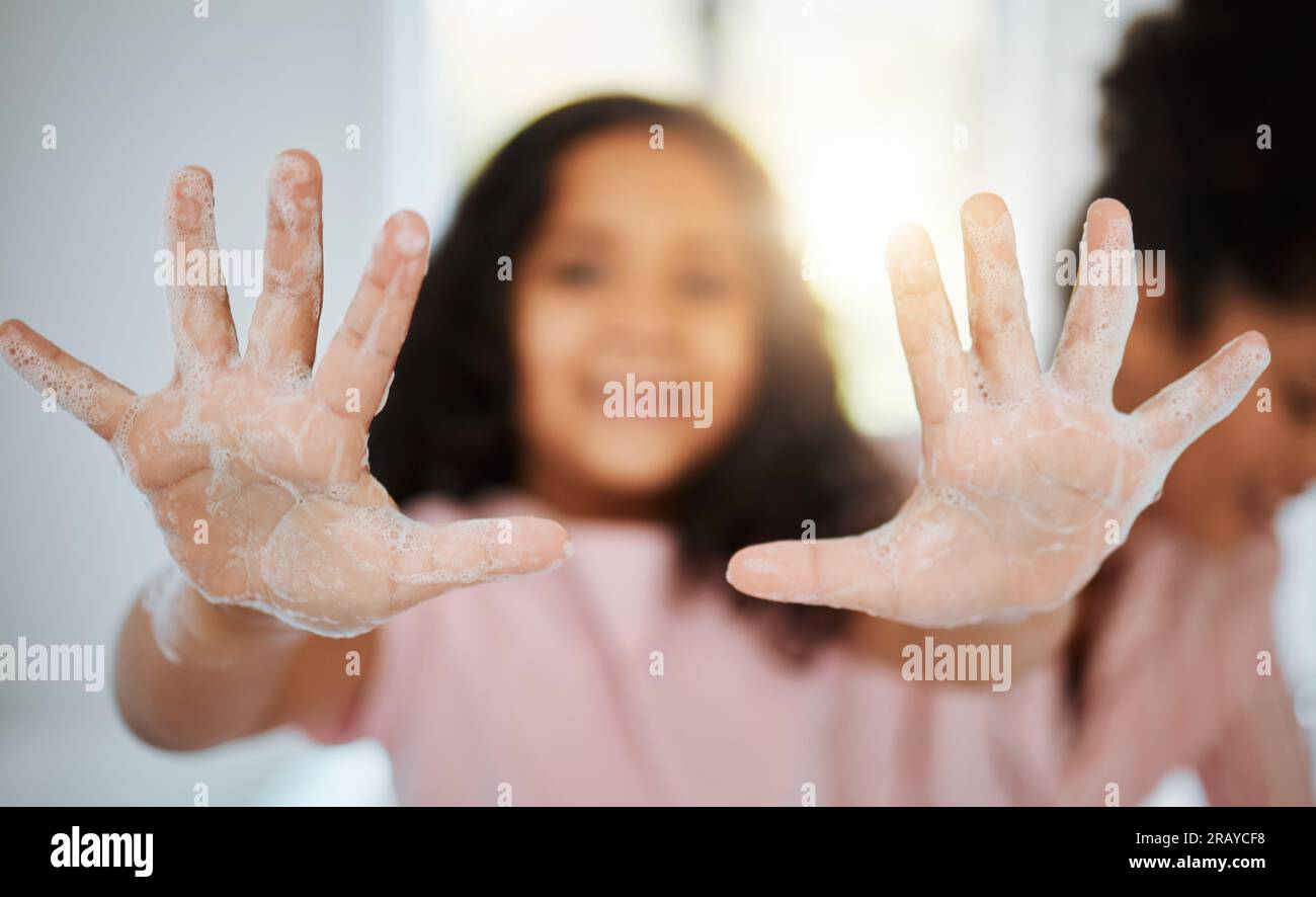 Girl kid, washing hands and palm in closeup with foam, cleaning and ...