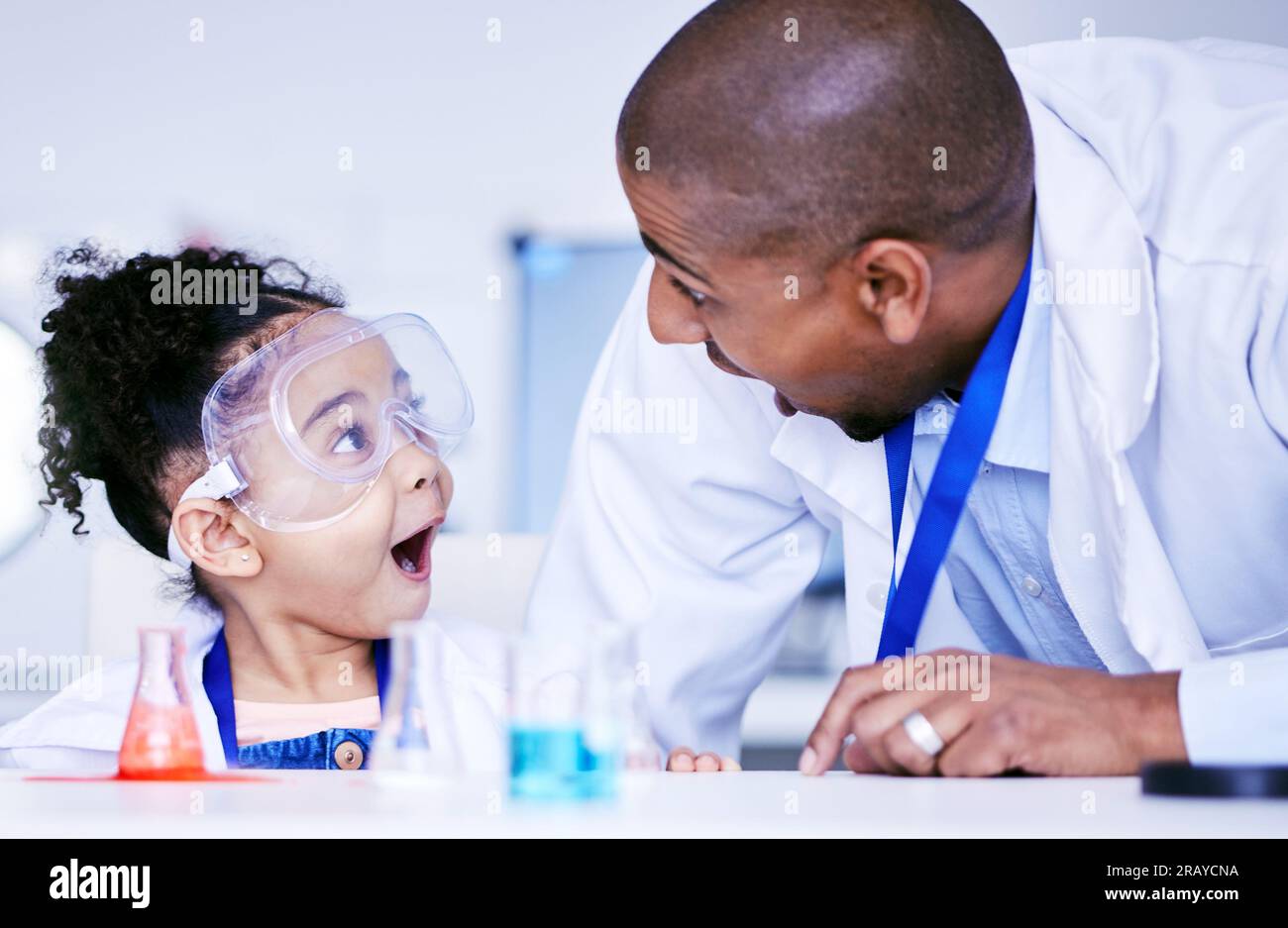 Chemistry, excited and father with child in laboratory for medical ...