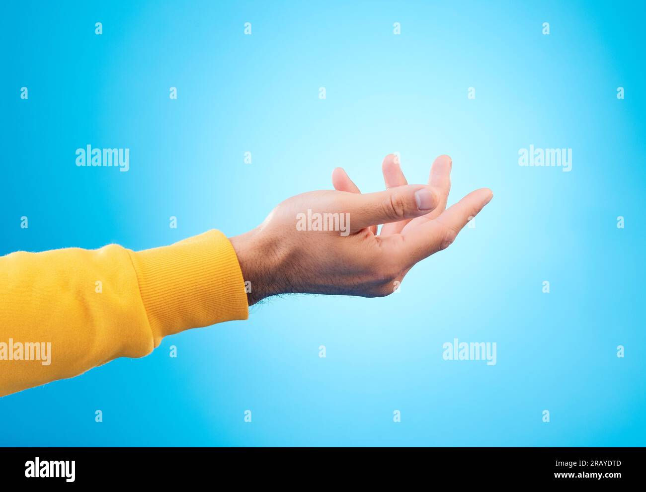 Hands, giving and man in studio for charity, donation or help with ...