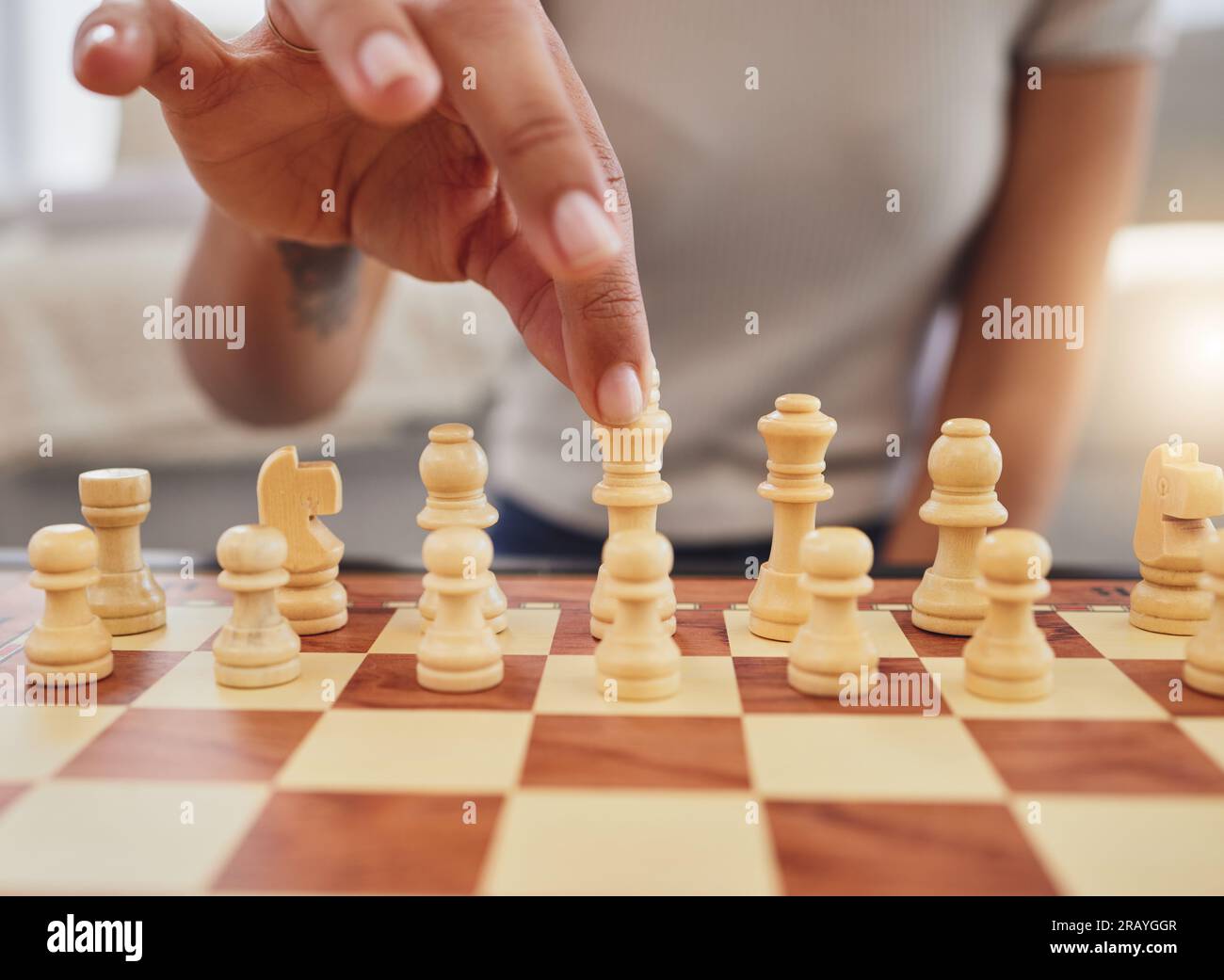 Chess player moving queen hi-res stock photography and images - Alamy