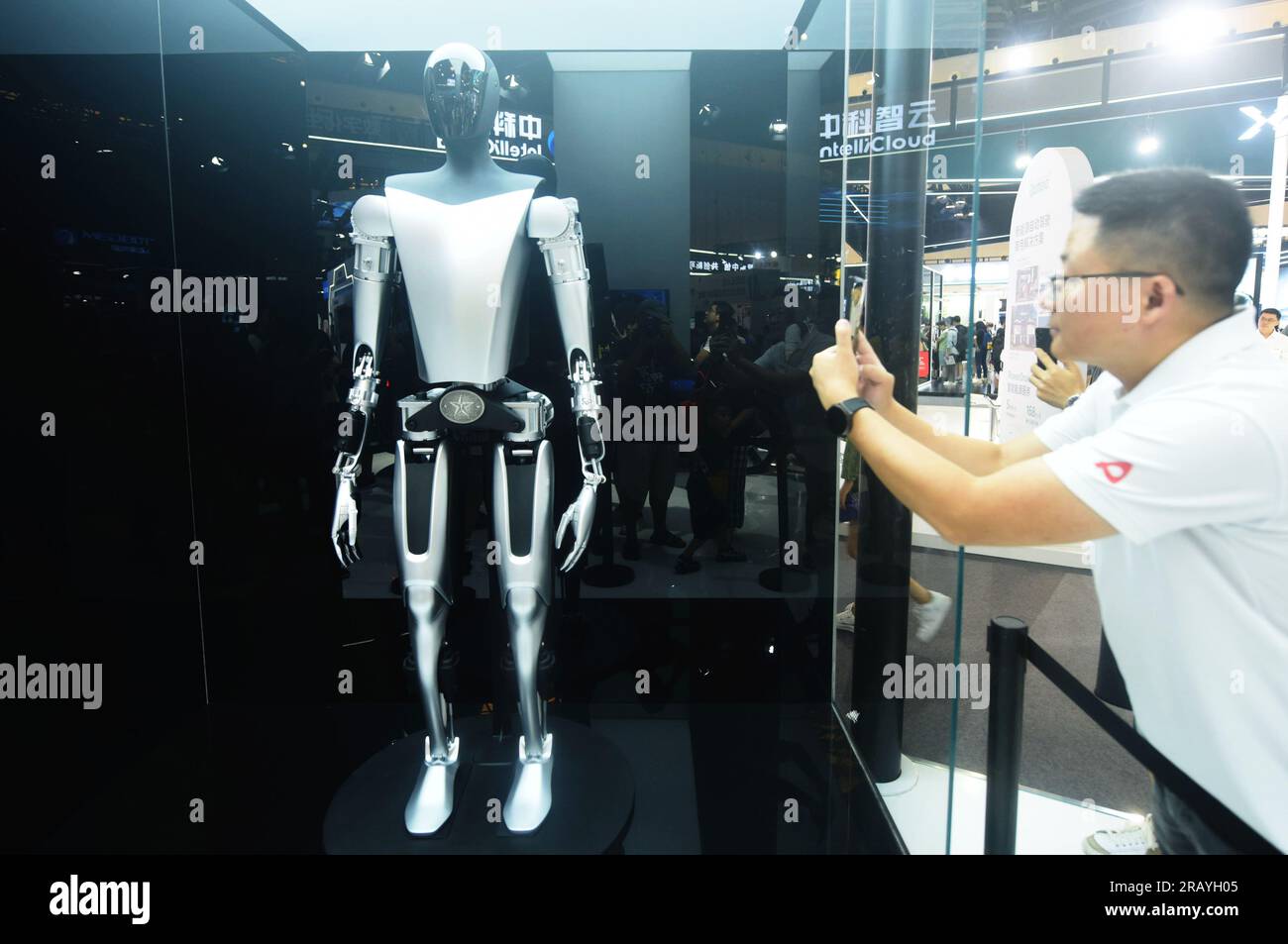 SHANGHAI, CHINA - JULY 6, 2023 - Spectators look at Tesla's "Optimus ...
