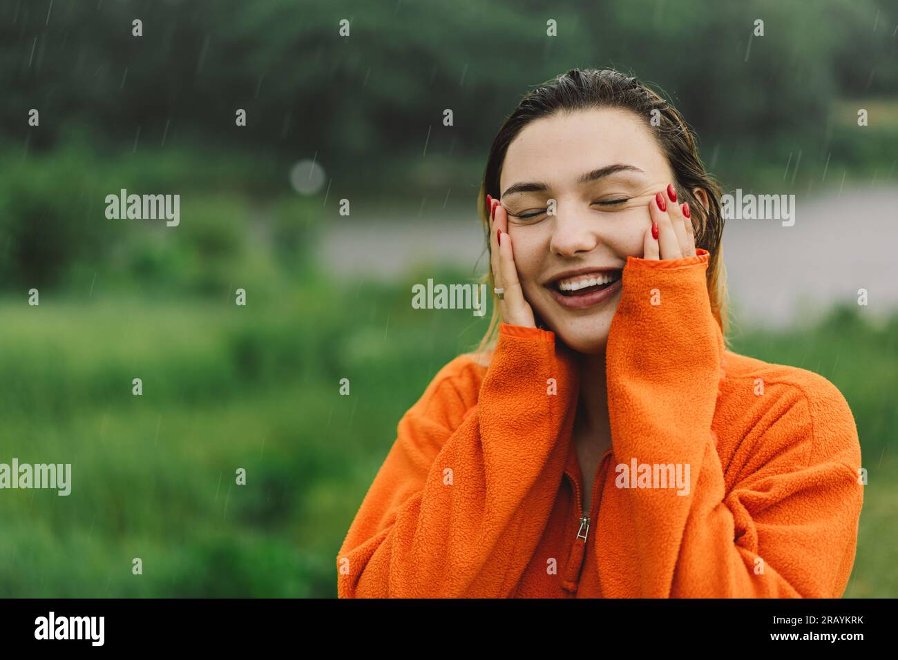 A girl enjoying rain hi-res stock photography and images - Alamy