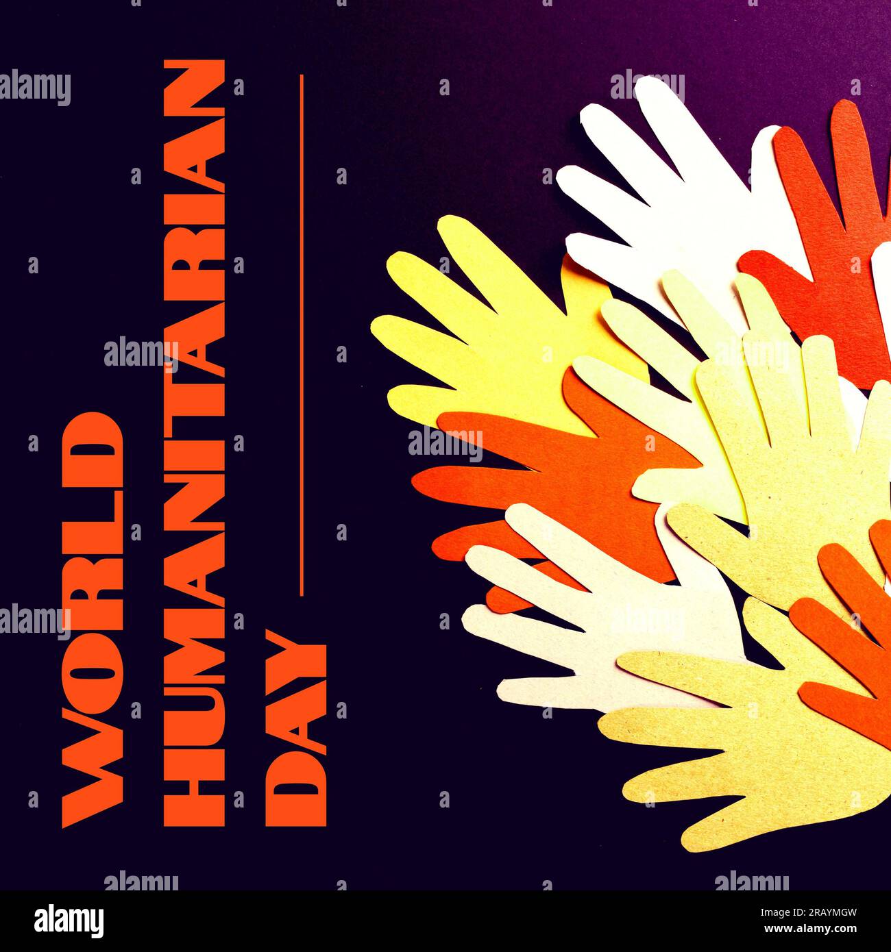 World humanitarian day text in red with yellow, red and white hands on ...