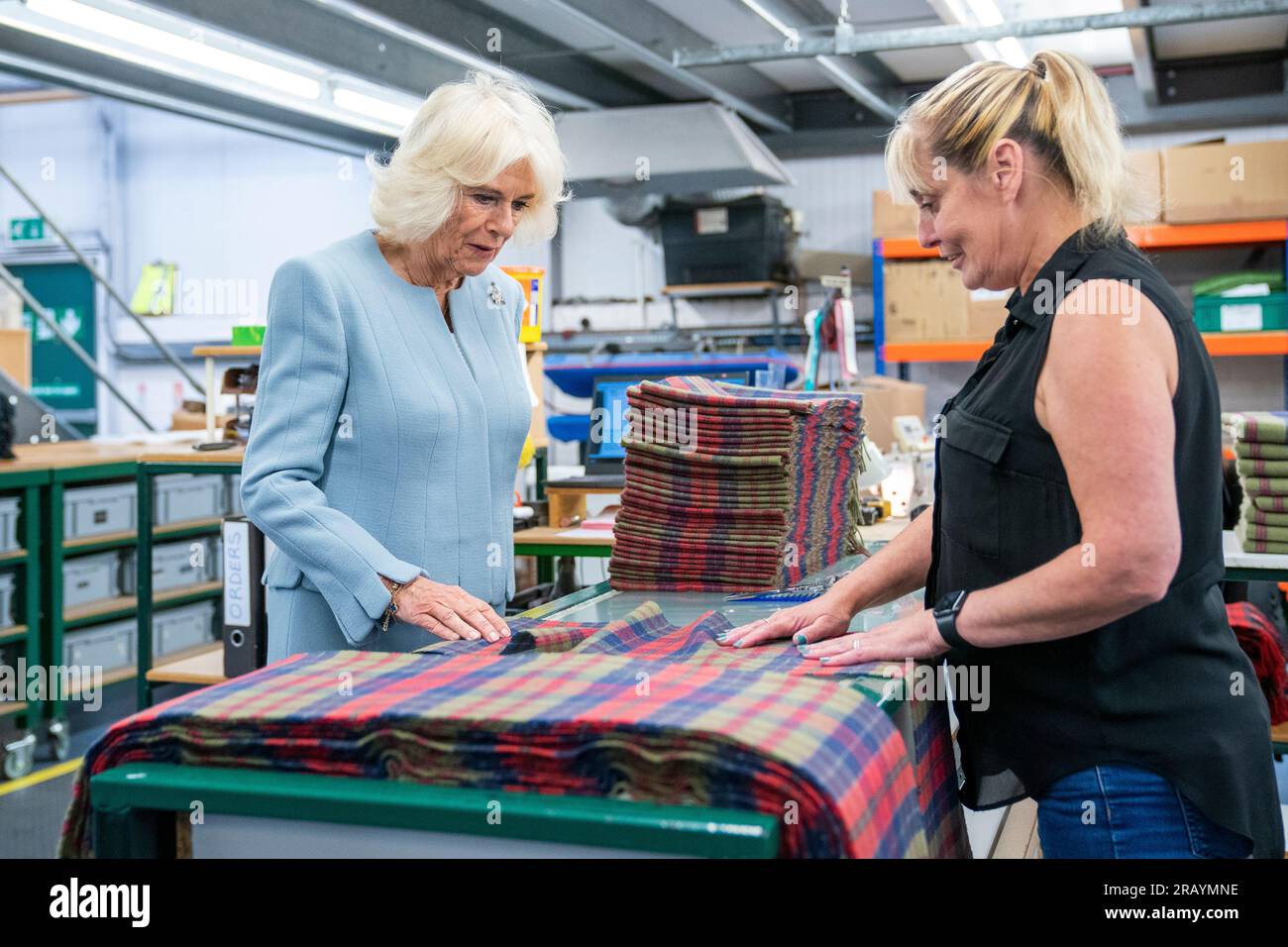 Queen Camilla (left) during a visit to Lochcarron of Scotland at the ...