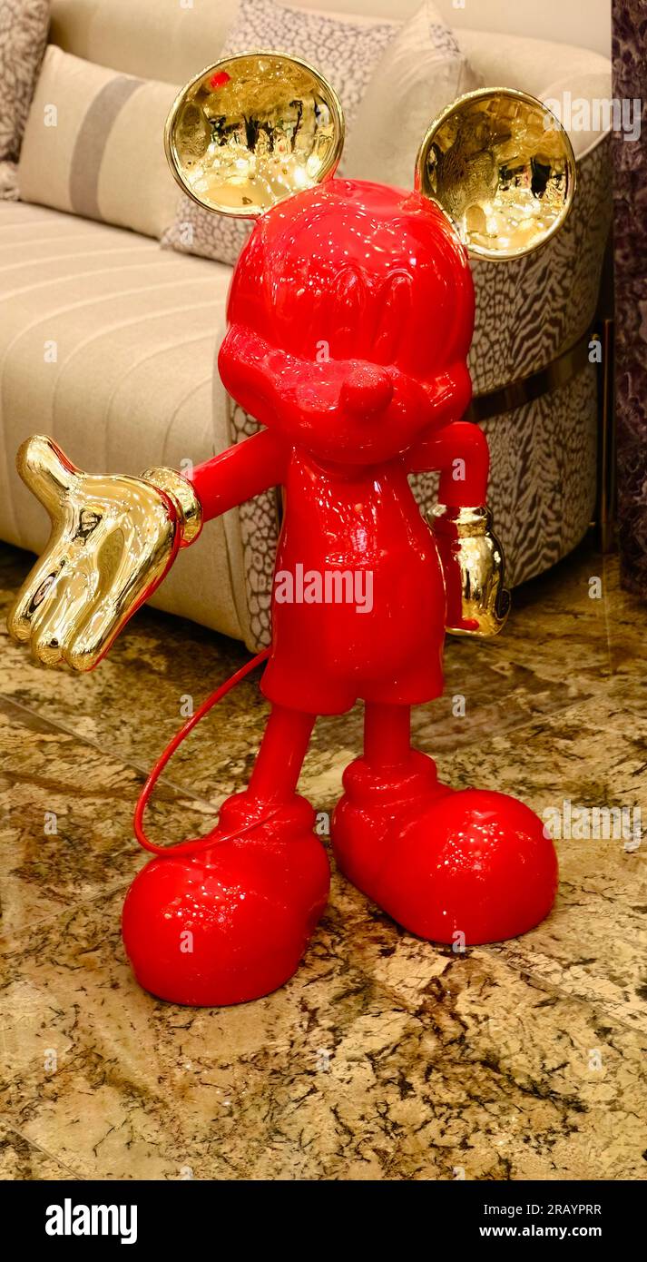 Red and gold shiny Mickey Mouse statue in the Venezia Fine Arts ...
