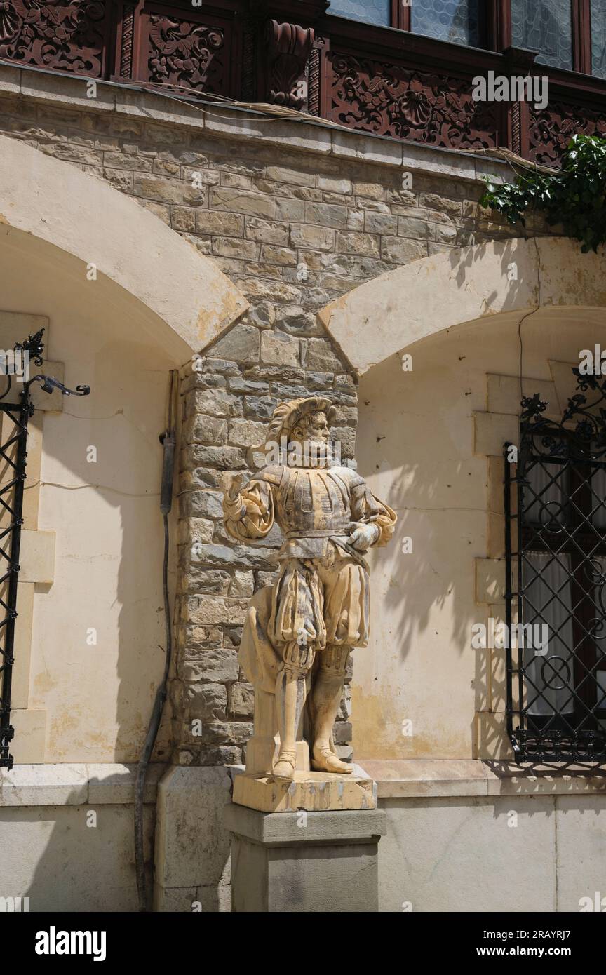 A statue in the inner court of Peles castle,Transylvania Stock Photo ...