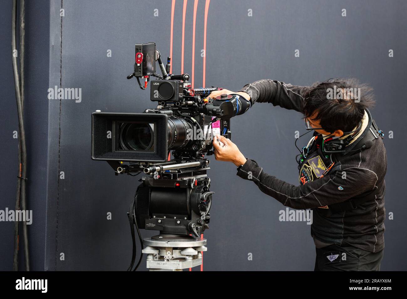APEX APXGP Team crew filming in the paddock for the F1 movie by Apple ...
