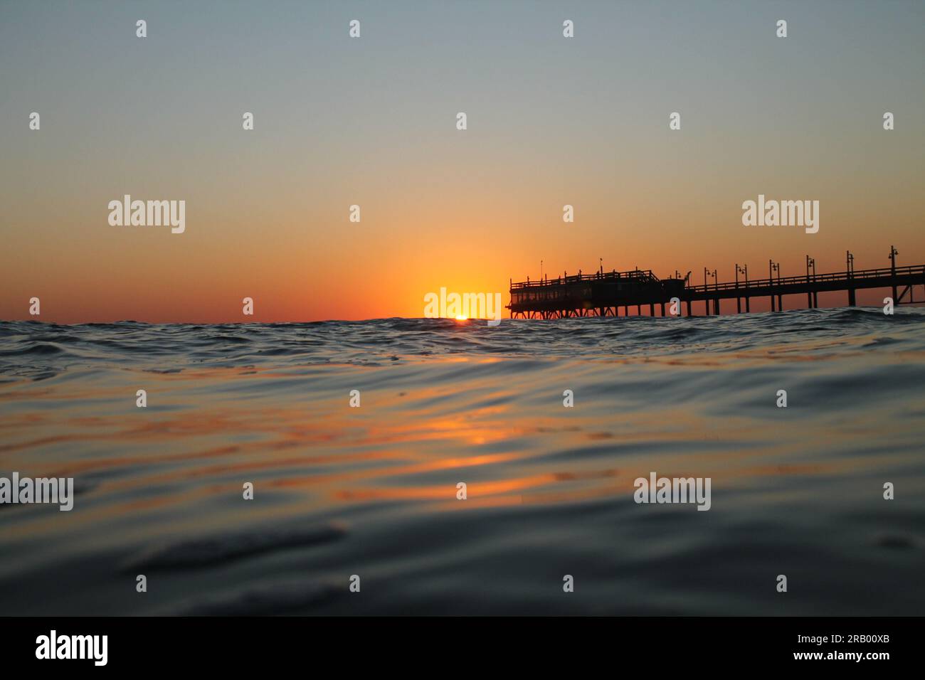 Sunset with the Jetty Stock Photo - Alamy
