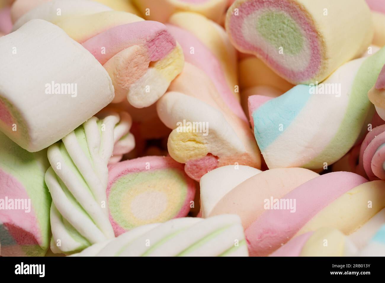 Multi-colored marshmallows. Background or texture of colorful blue and ...