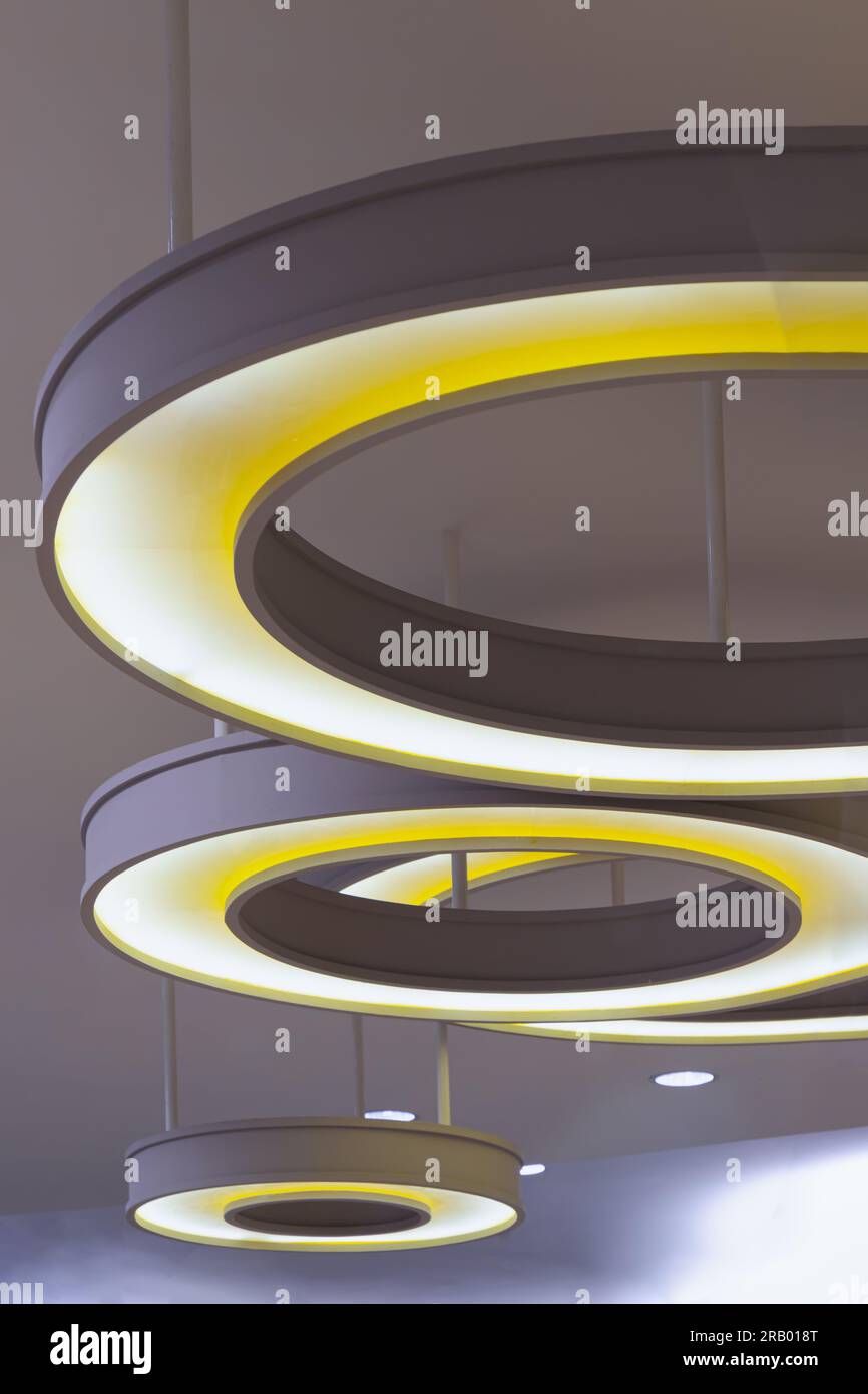 The hanging rounded ceiling mounted light fixtures with modern LED ...