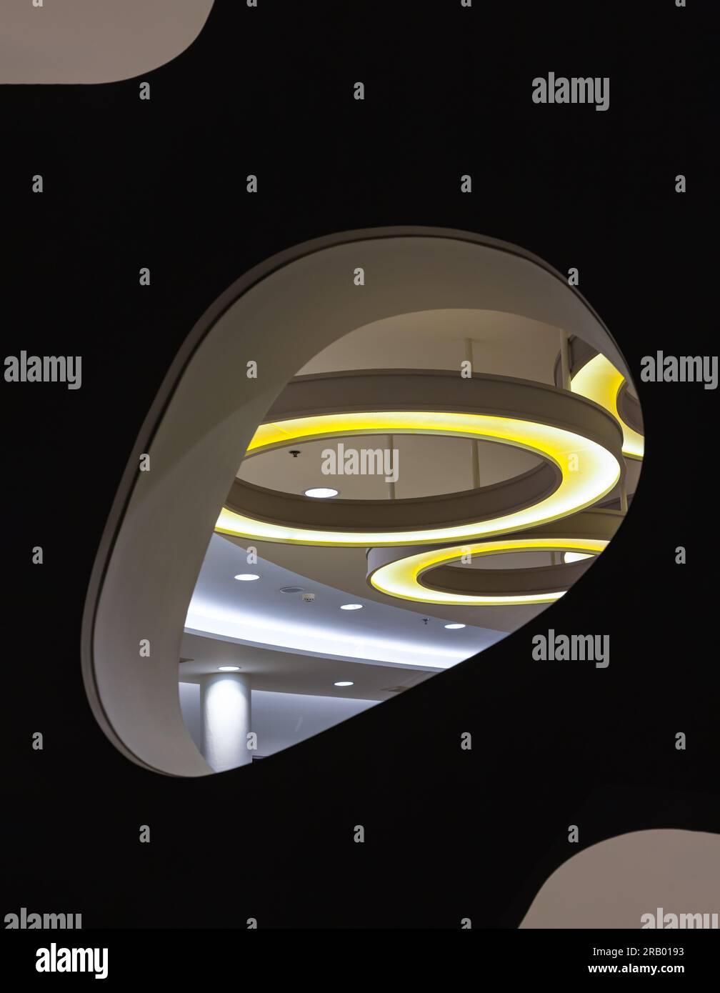 Looking through the Glass mirrored wall panels in the living room can ...