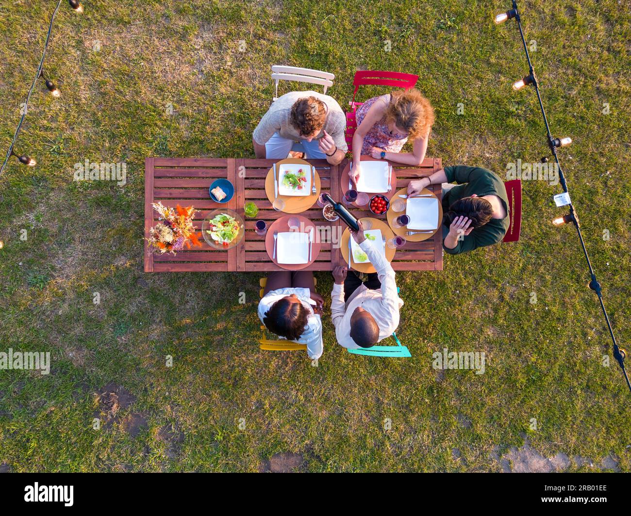 Gathered around table above view hi-res stock photography and images ...