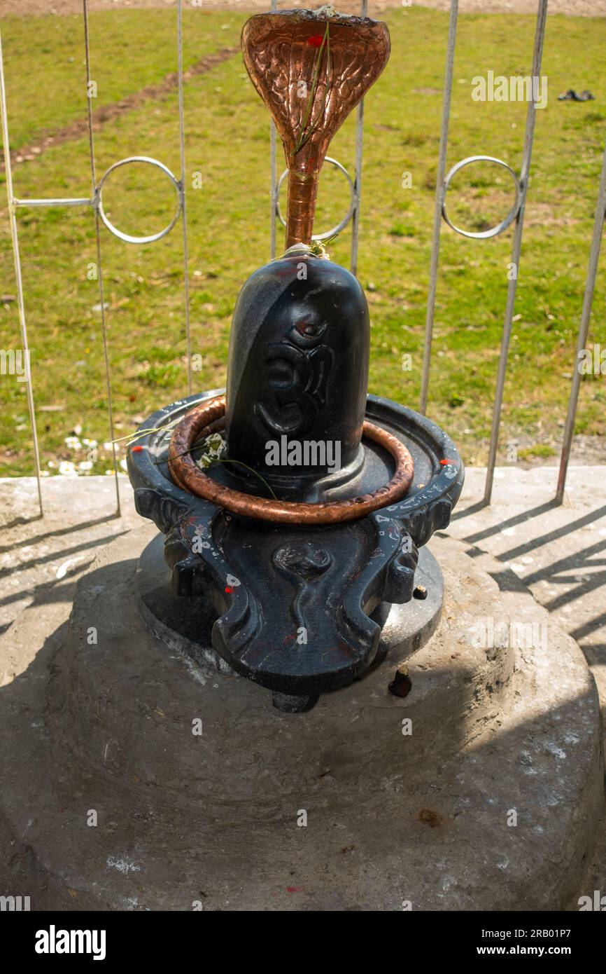 June 28th 2023,Nagthat, Uttarakhand, India.Black stone Shiva Linga, a ...
