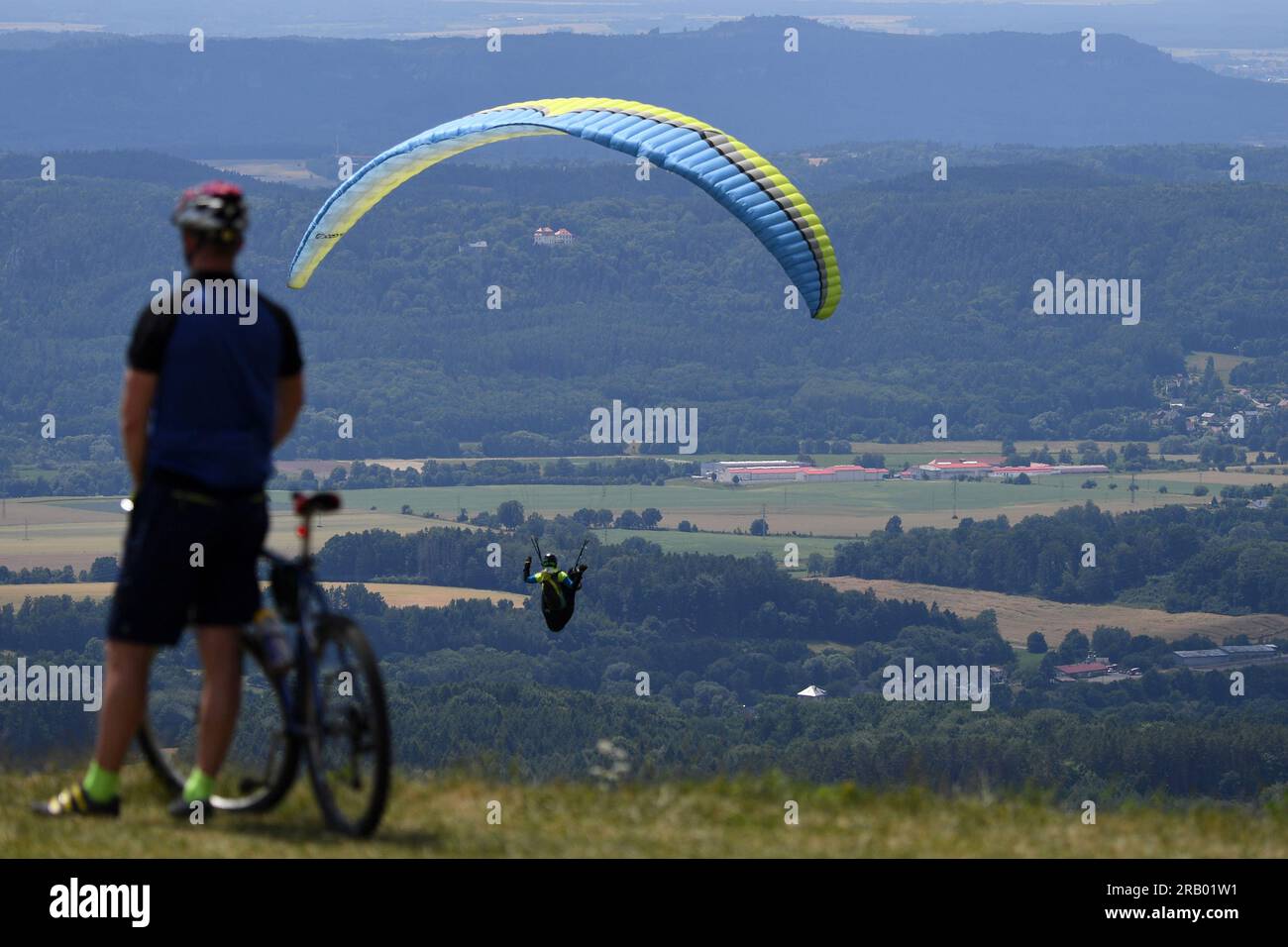 Kozakov, Czech Republic. 6th July, 2023. A Paraglider flies from ...