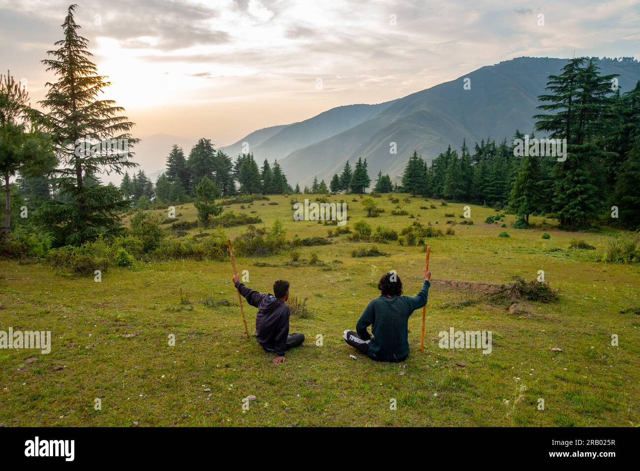June 28th, 2023, Nagthat, Uttarakhand, India. Hikers immersed in a ...