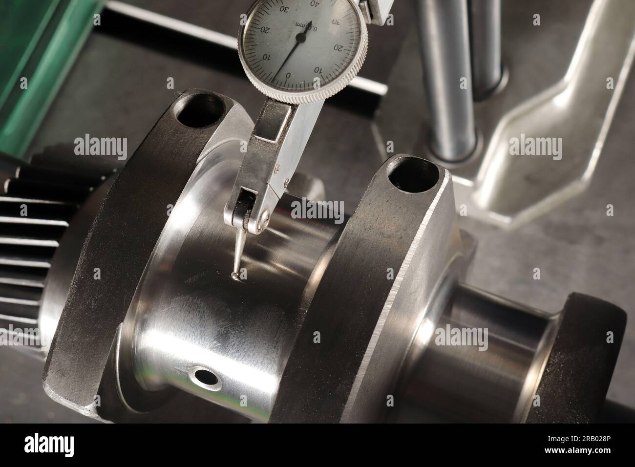 Master makes metal hardness measurement. Crankshaft Stock Photo - Alamy