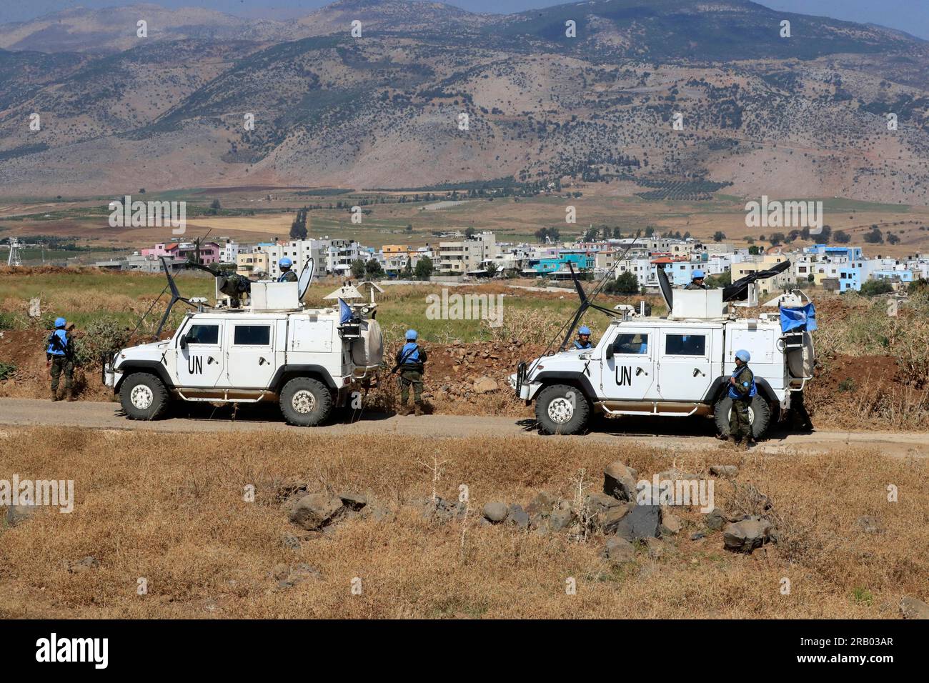 U.N. peacekeepers patrol on the Lebanese side of the Lebanese-Israeli ...
